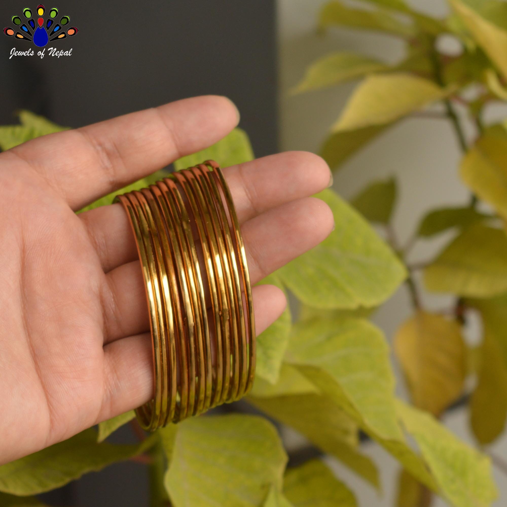 Jewels of Nepal Antique Golden Toned Metallic Set Bangles For Women ...